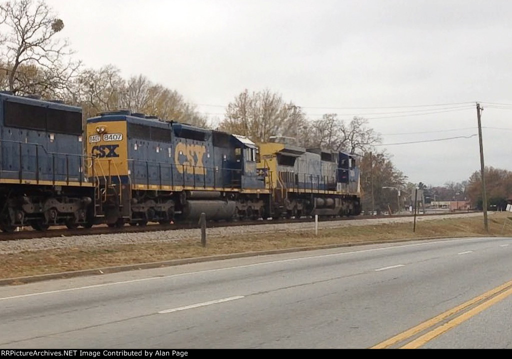 CSX 7824, 8407, and 2490 head WB